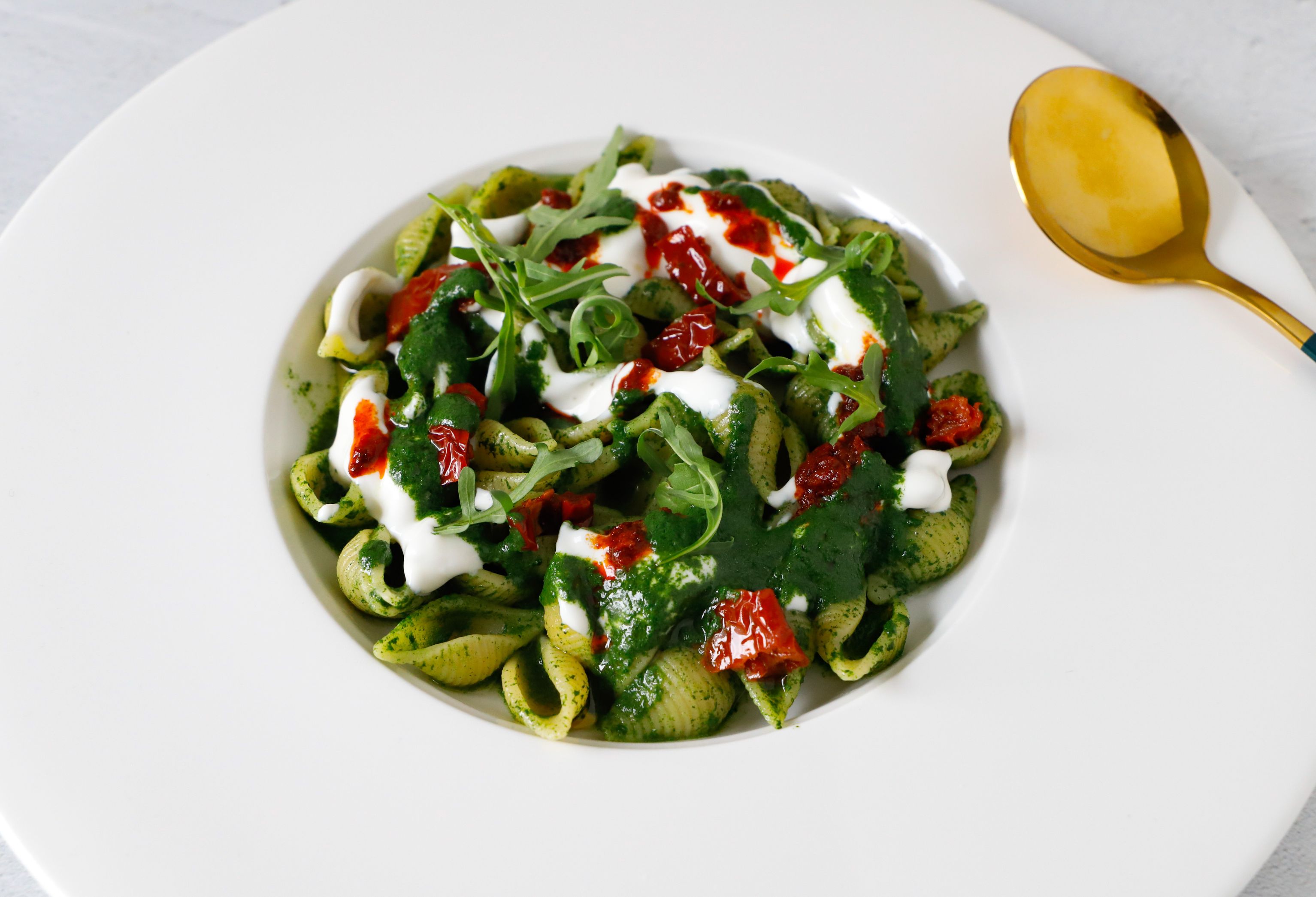 Conchigliette con rucola, ‘nduja e pomodori secchi